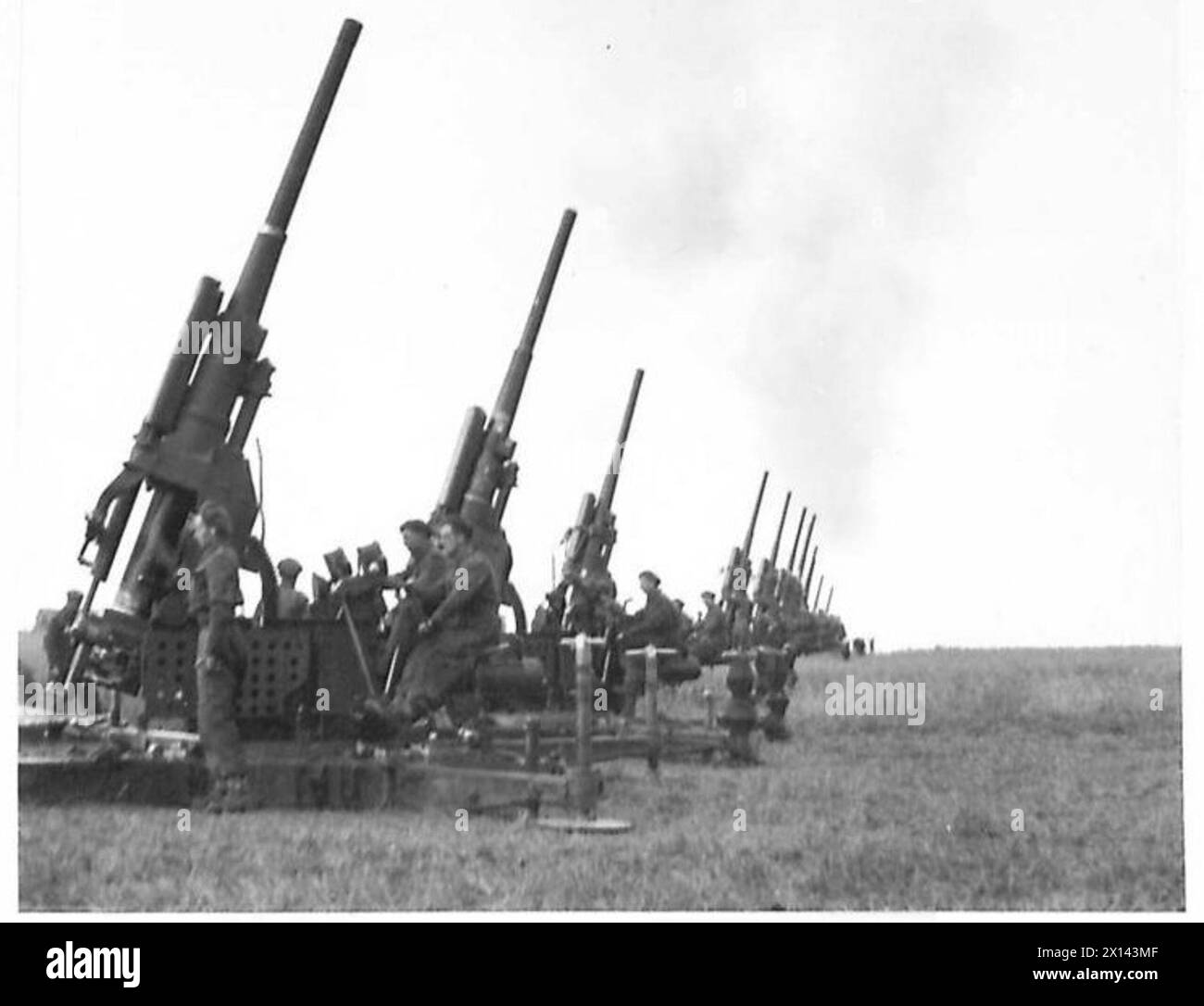 A ceremonial salute is fired by the British Army's 21st Army Group to ...