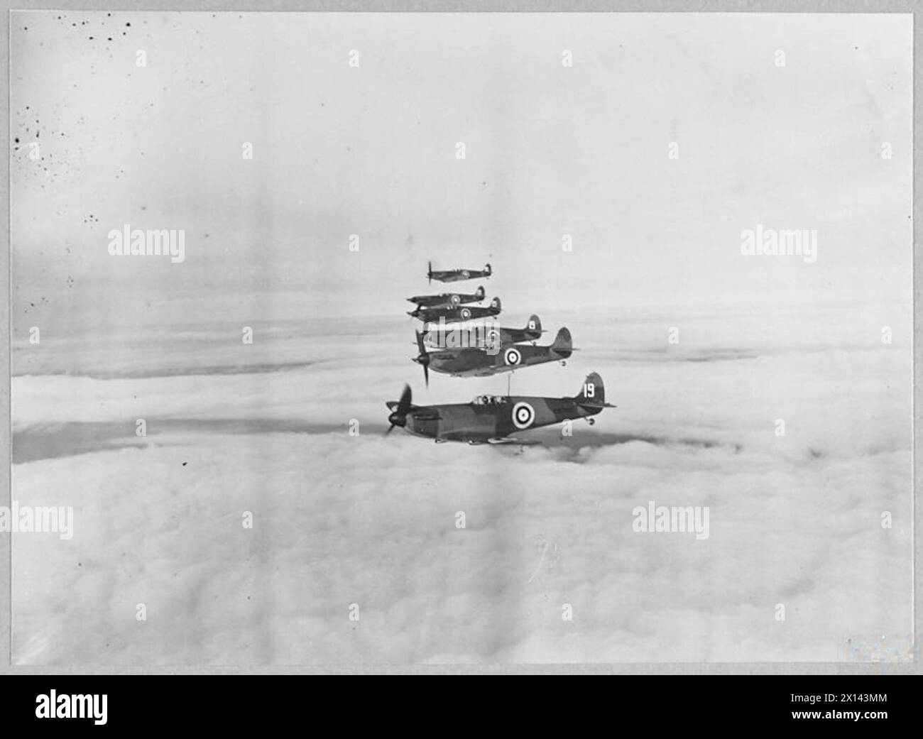 RAF FIGHTER COMMAND - Spitfires of No. 19 Squadron flying in formation ...