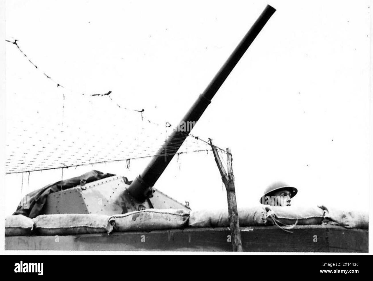 A British Army gun emplacement is manned with a lookout to monitor ...
