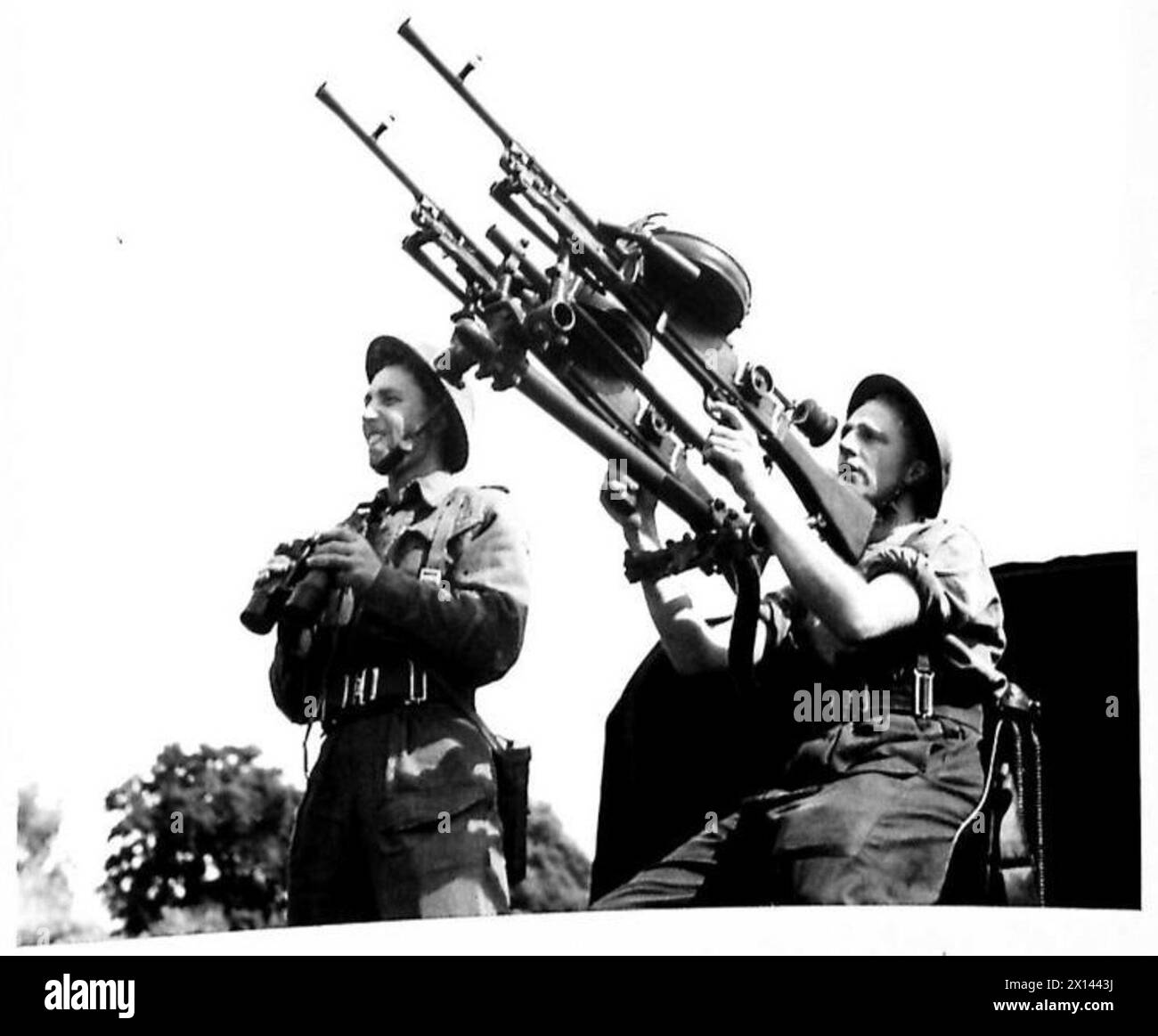 LARGE SCALE EXERCISE - A multiple Bren gun crew keep a lookout for ...