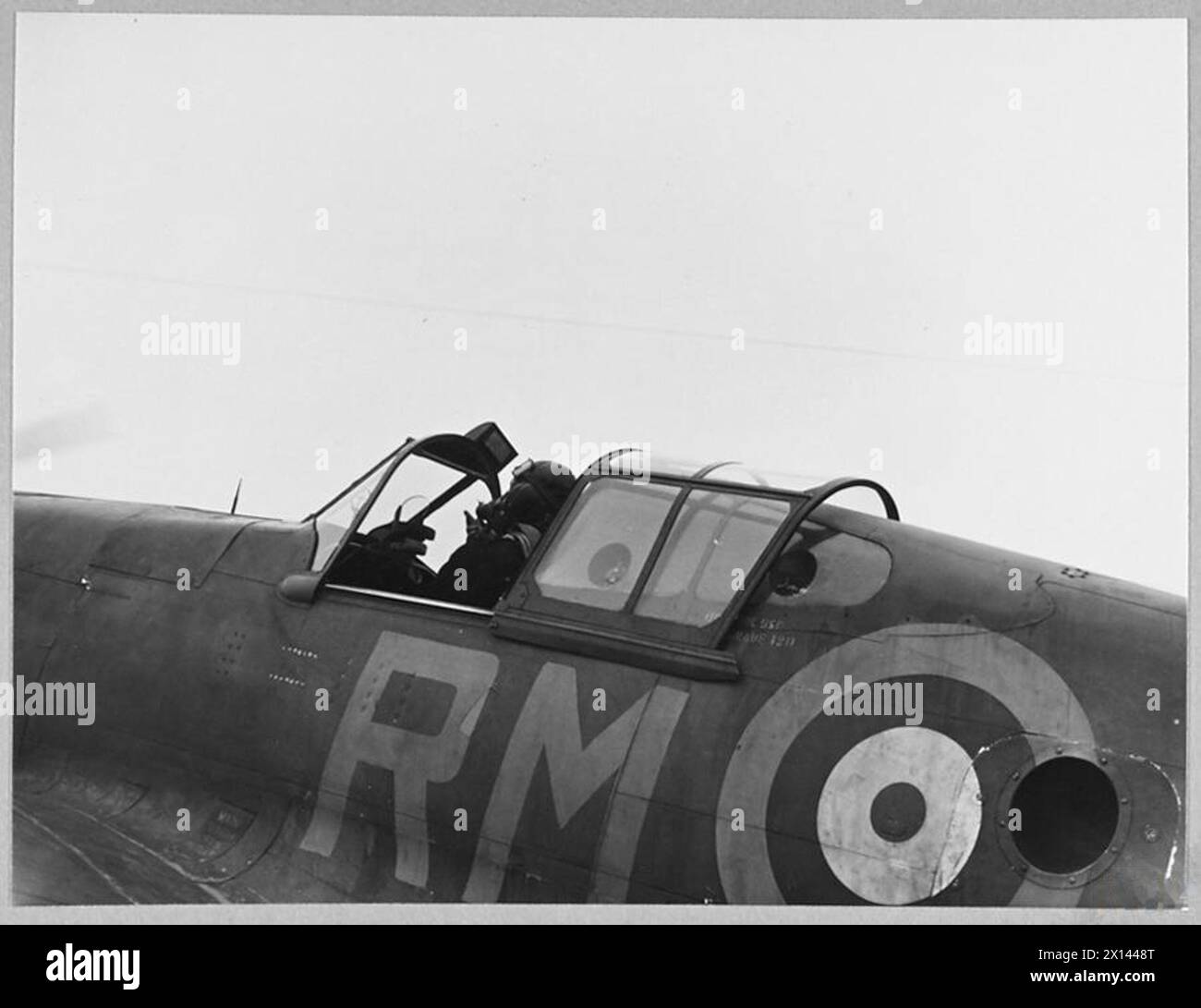 An RAF/Army cooperation unit pilot releases a message in a weighted ...