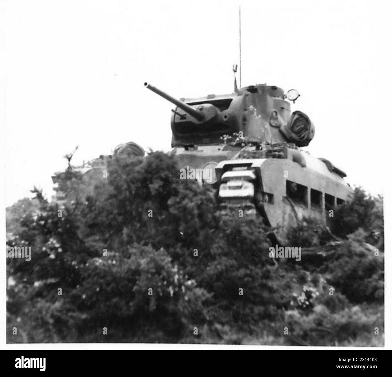 TANKS IN TRAINING - One of the tanks travelling at speed over rough ...