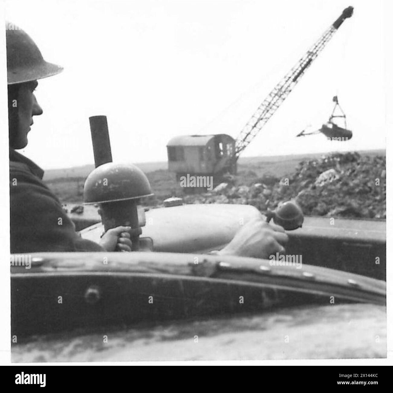 A British Army soldier operates an American bulldozer during ...