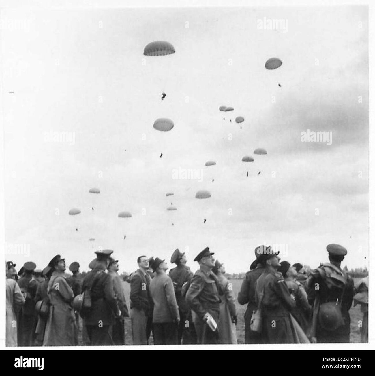 Photographs show parachute troops dropping during a demonstration ...