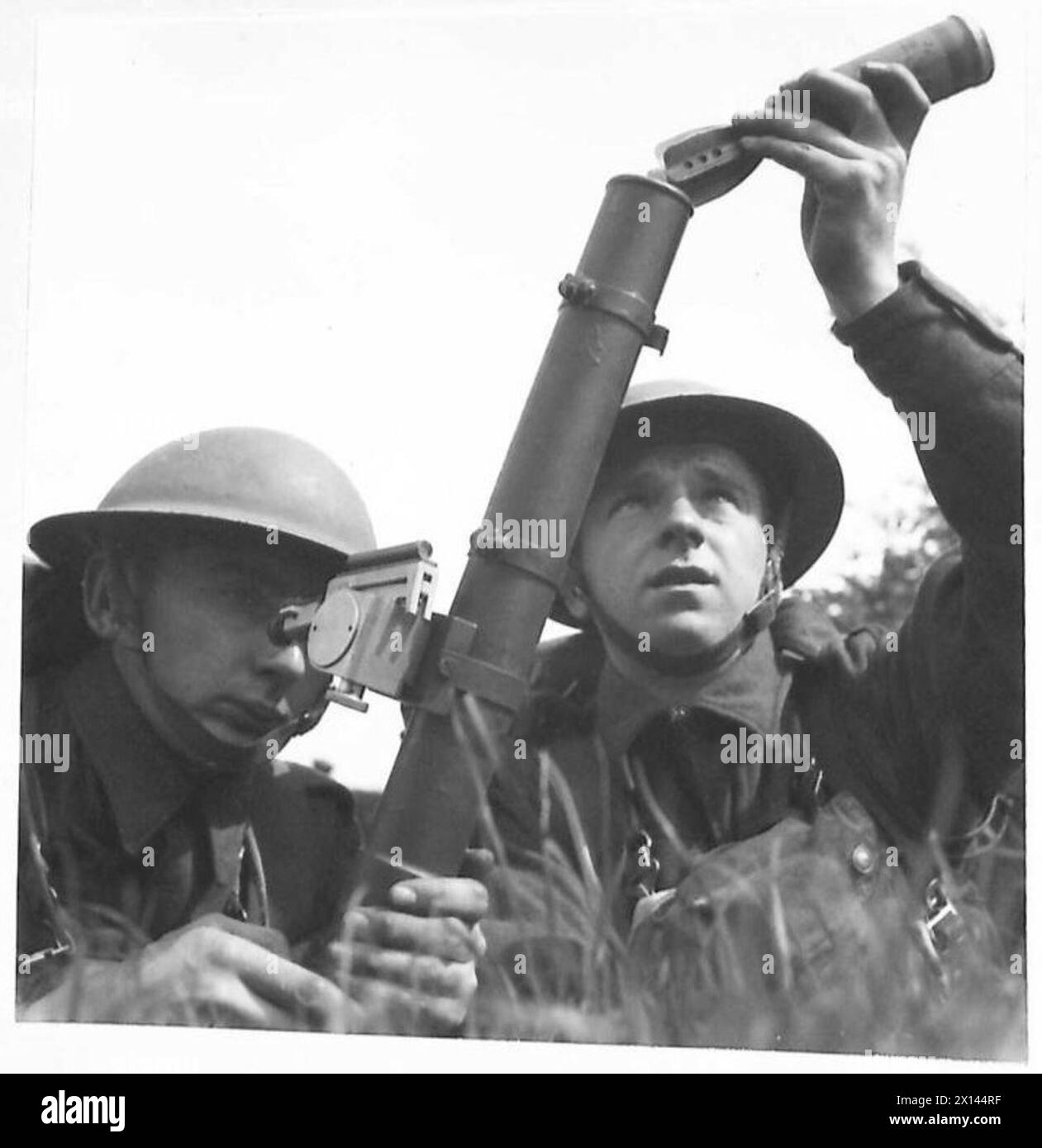 THE EYES AND EARS OF THE ARMY - Two inch mortars in action , British ...