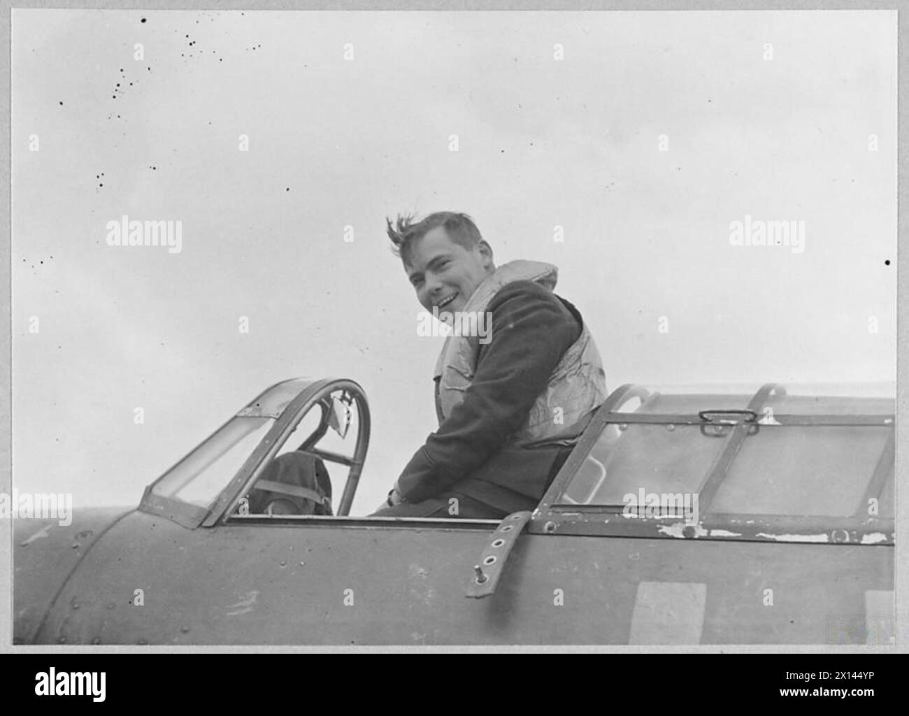 A Hurricane pilot of No. 601 (City of London) Squadron is pictured in ...
