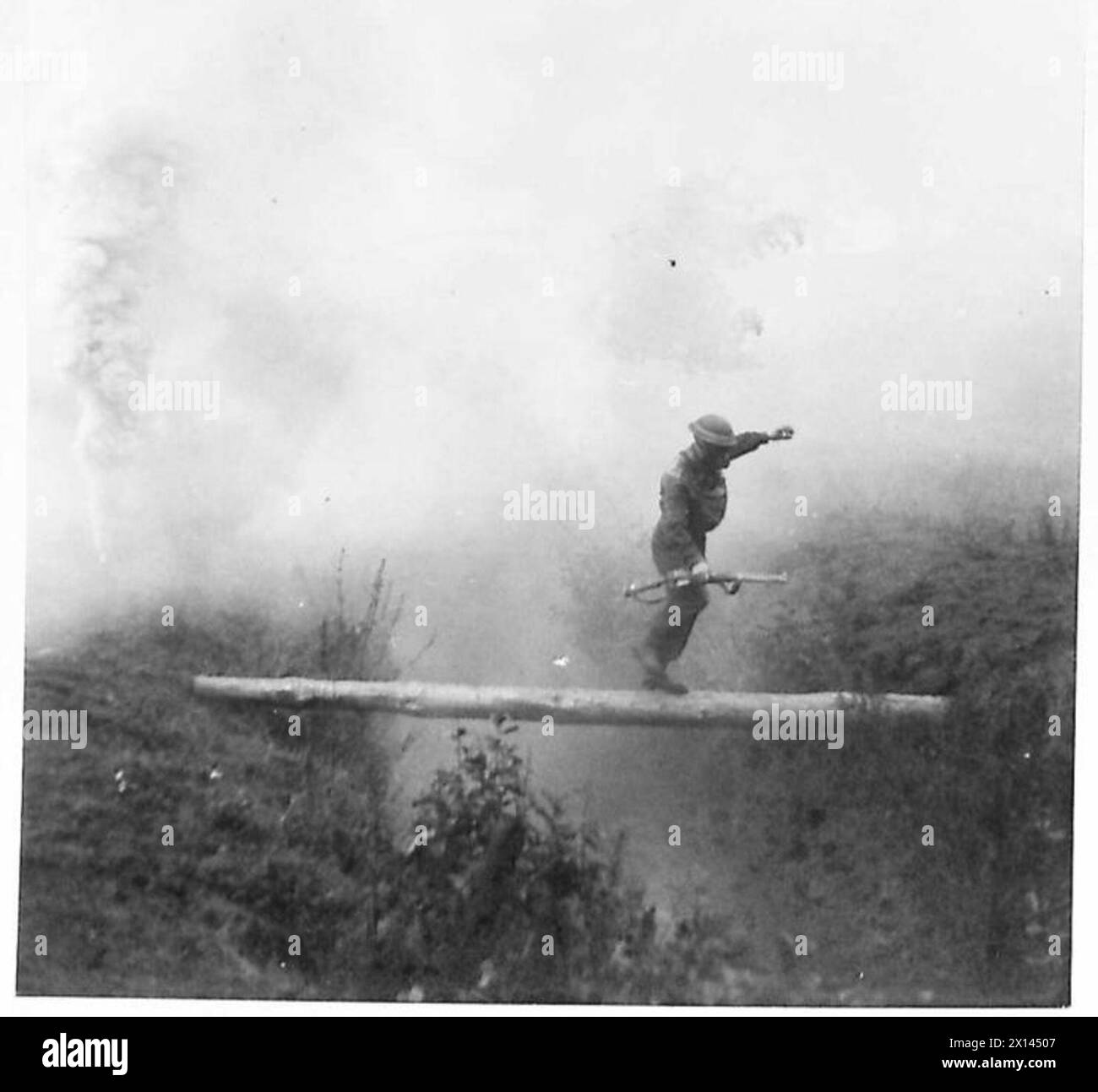 Military personnel battle fire Black and White Stock Photos & Images ...