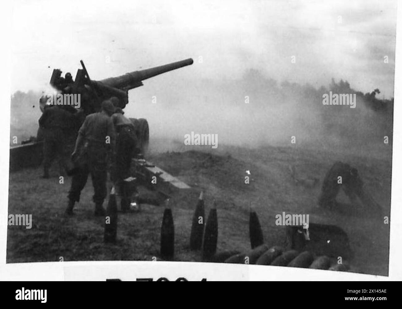 A heavy gun fires at enemy positions during British Army operations ...