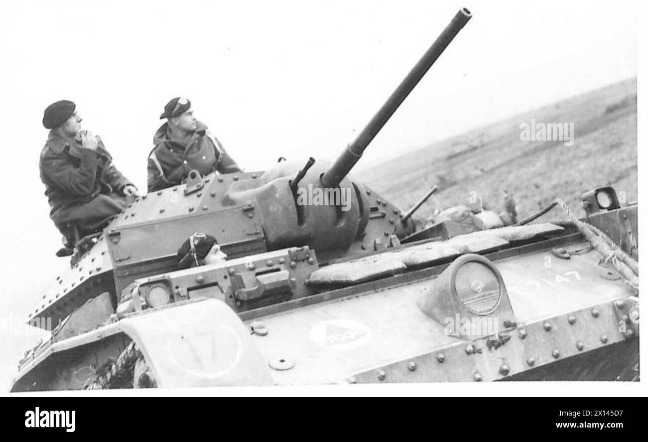 ARMOURED DIVISION TRAIN FOR BATTLE - Angle shots of "Covenanter" tanks ...