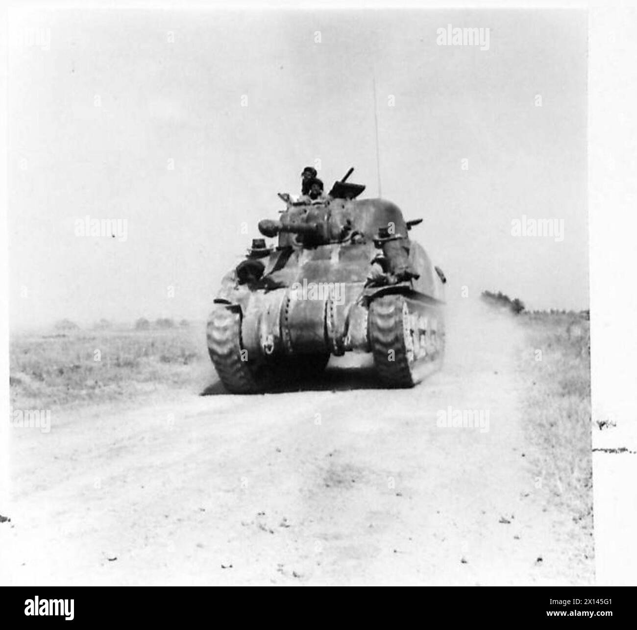 A Sherman tank advances in the Catania area as part of British Army ...