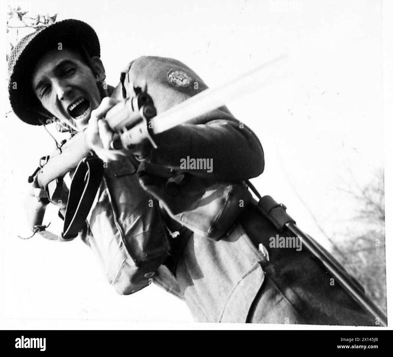THE OFFENSIVE SPIRIT - A view from a trench as an infantryman lunges ...