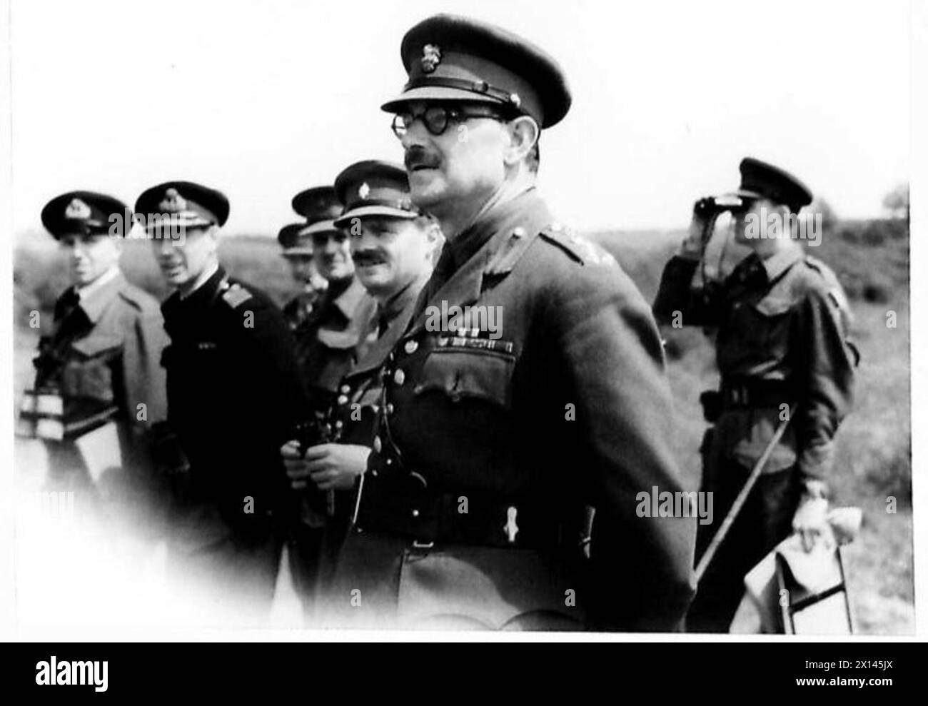Officers observe operations in Black and White Stock Photos & Images ...