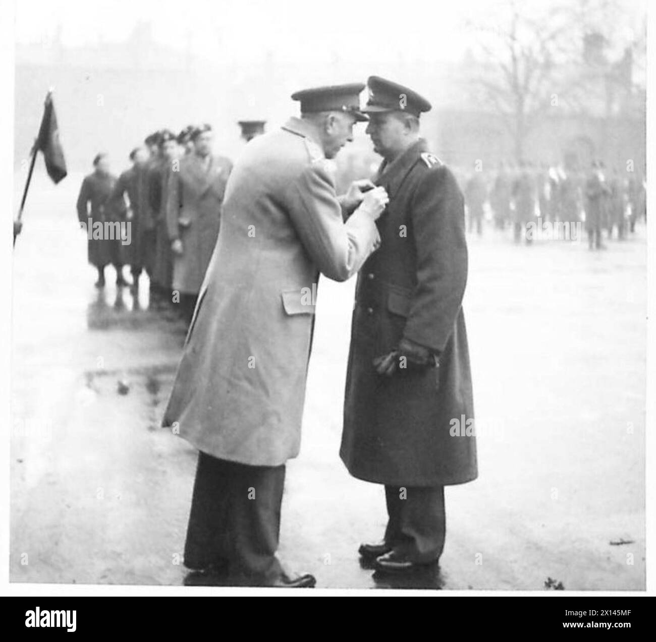 Captain Alois Schwitzer of Czechoslovakia receives the M.B.E. from ...