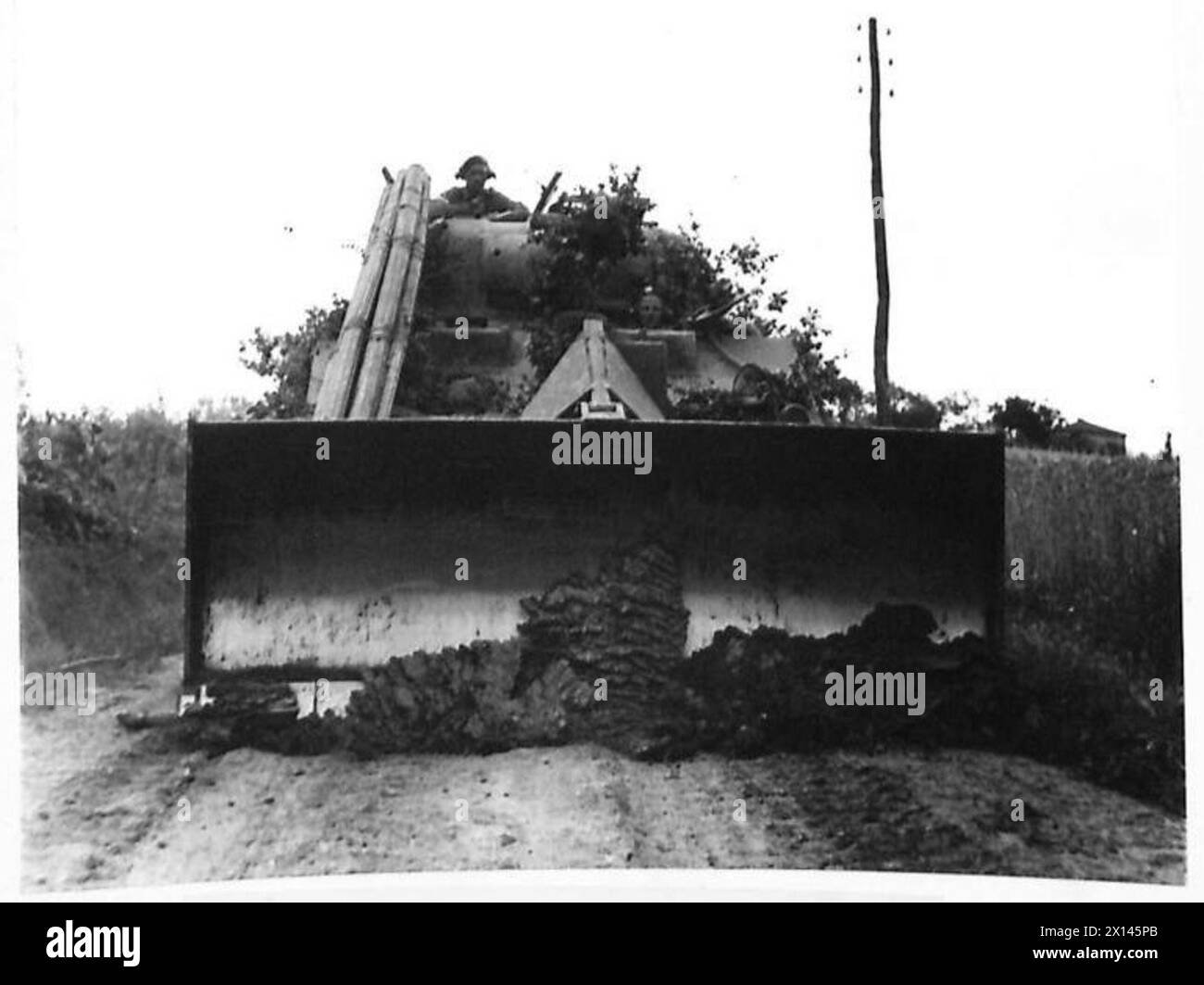 EIGHTH ARMY : SHERMAN BULLDOZER - The Sherman bulldozer is proving a ...