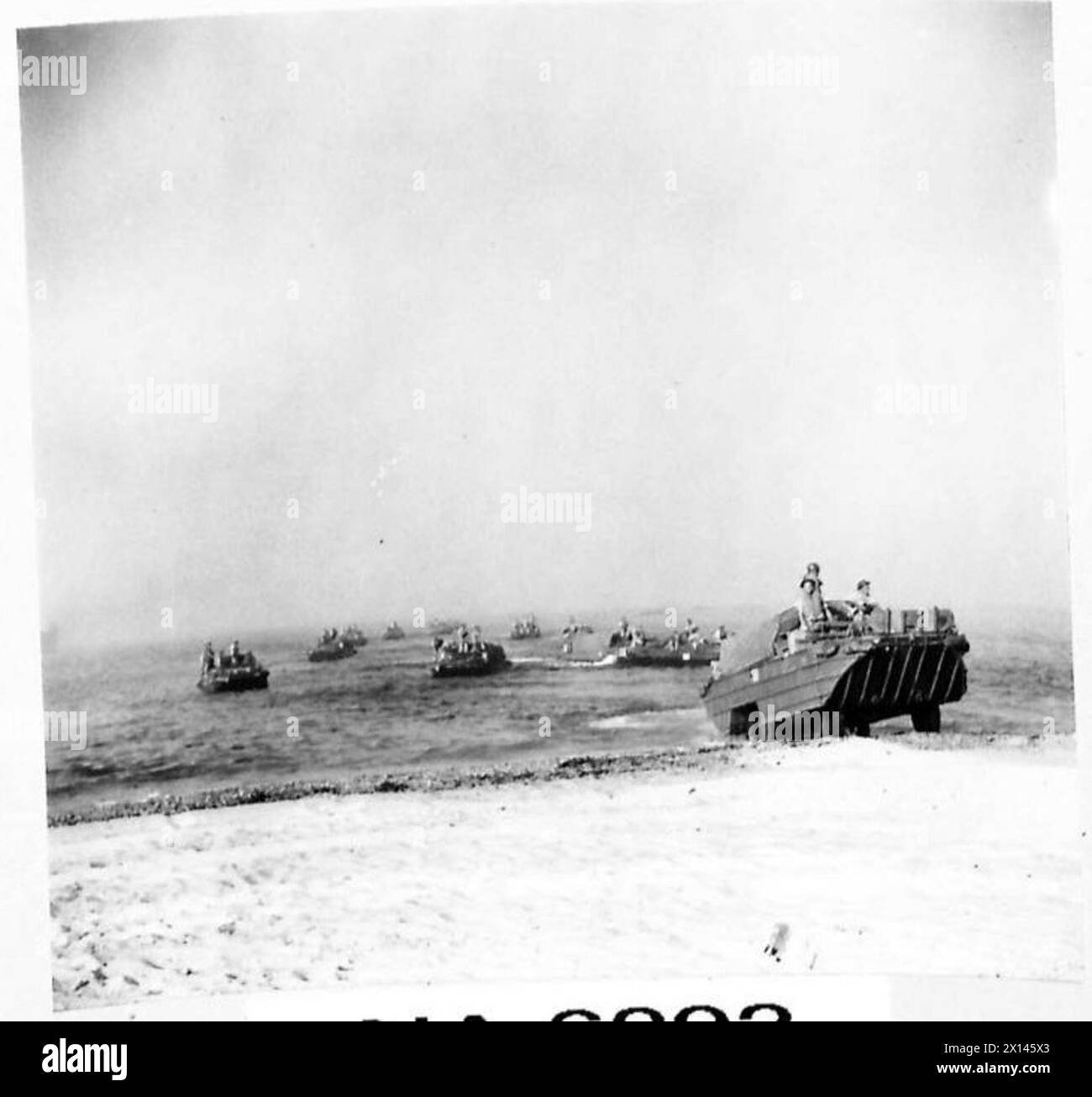 INVASION OF ITALY - Canadian troops coming ashore in "Ducks" , British ...