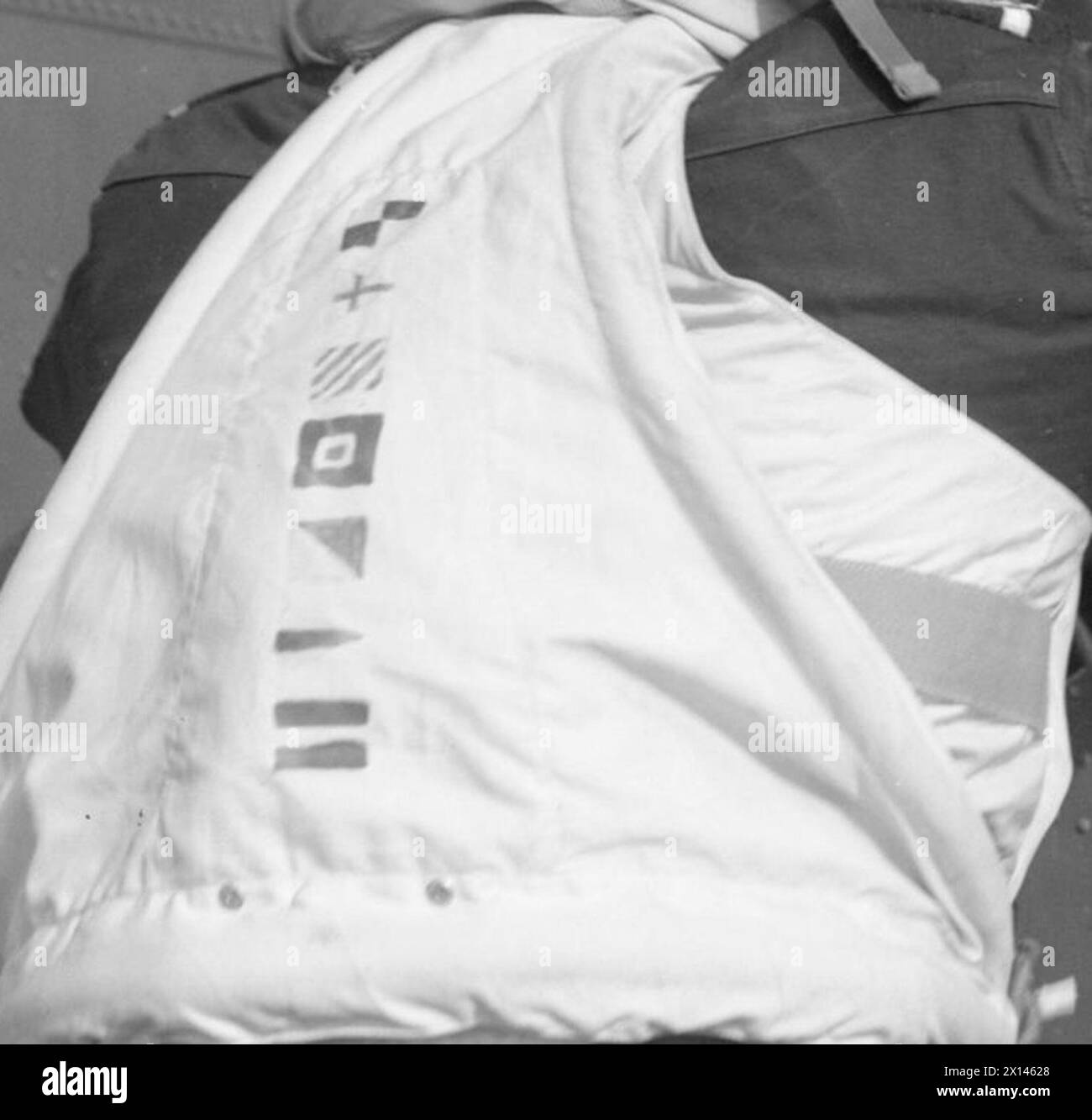 Sub-Lieutenant Rabone, RNVR, aboard HMS Victorious writes his name in ...