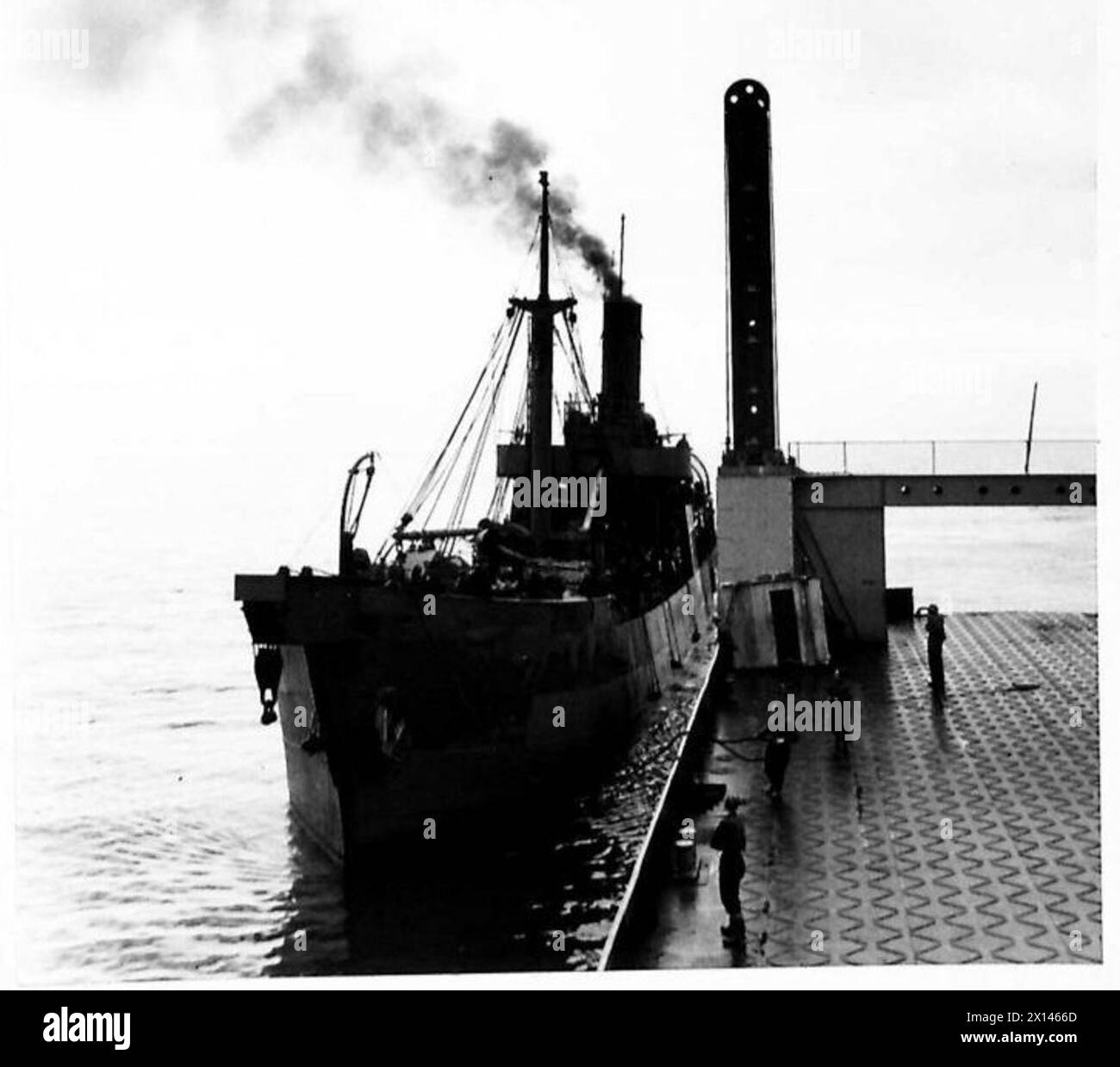The 700-ton ship Sir William Venning is shown berthing alongside a Spud ...