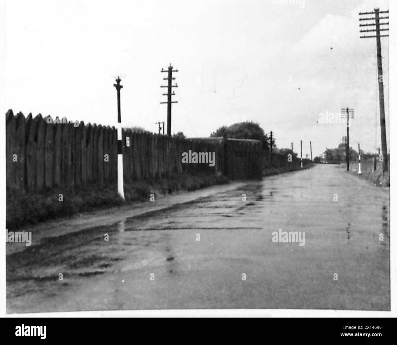 CAMOUFLAGED STRONG POINTS - Octagonal pillbox; railway sleeper fence ...