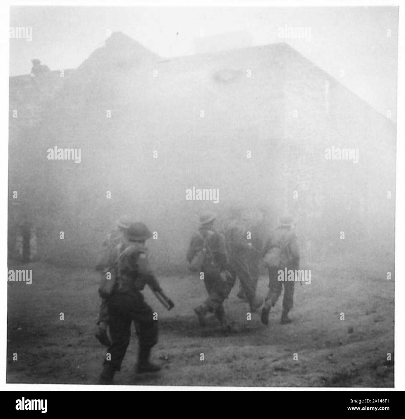 British Home Guards advance through smoke screens to reach objectives ...