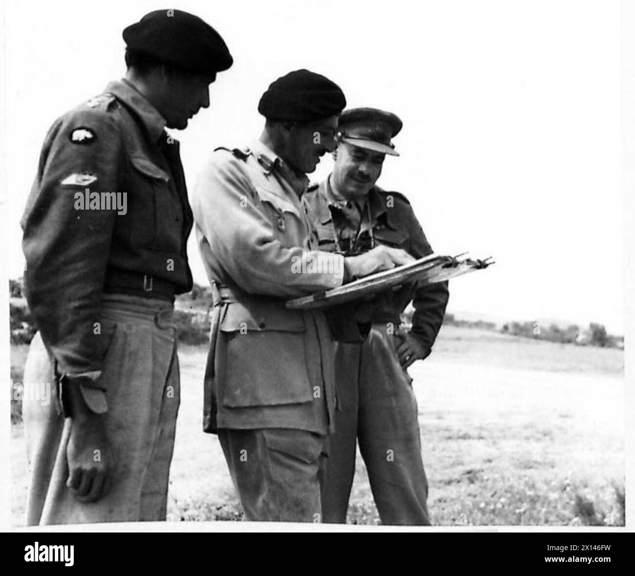 Staff officers of the 1st Armoured Division plan an attack on Goubellat ...