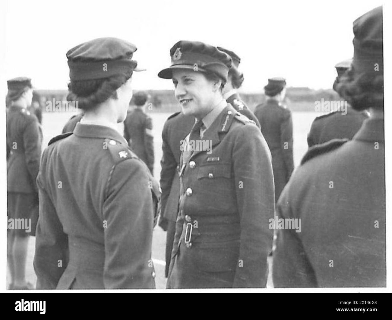 Chief Controller L.V.L.E. Whateley converses with an ATS private during ...