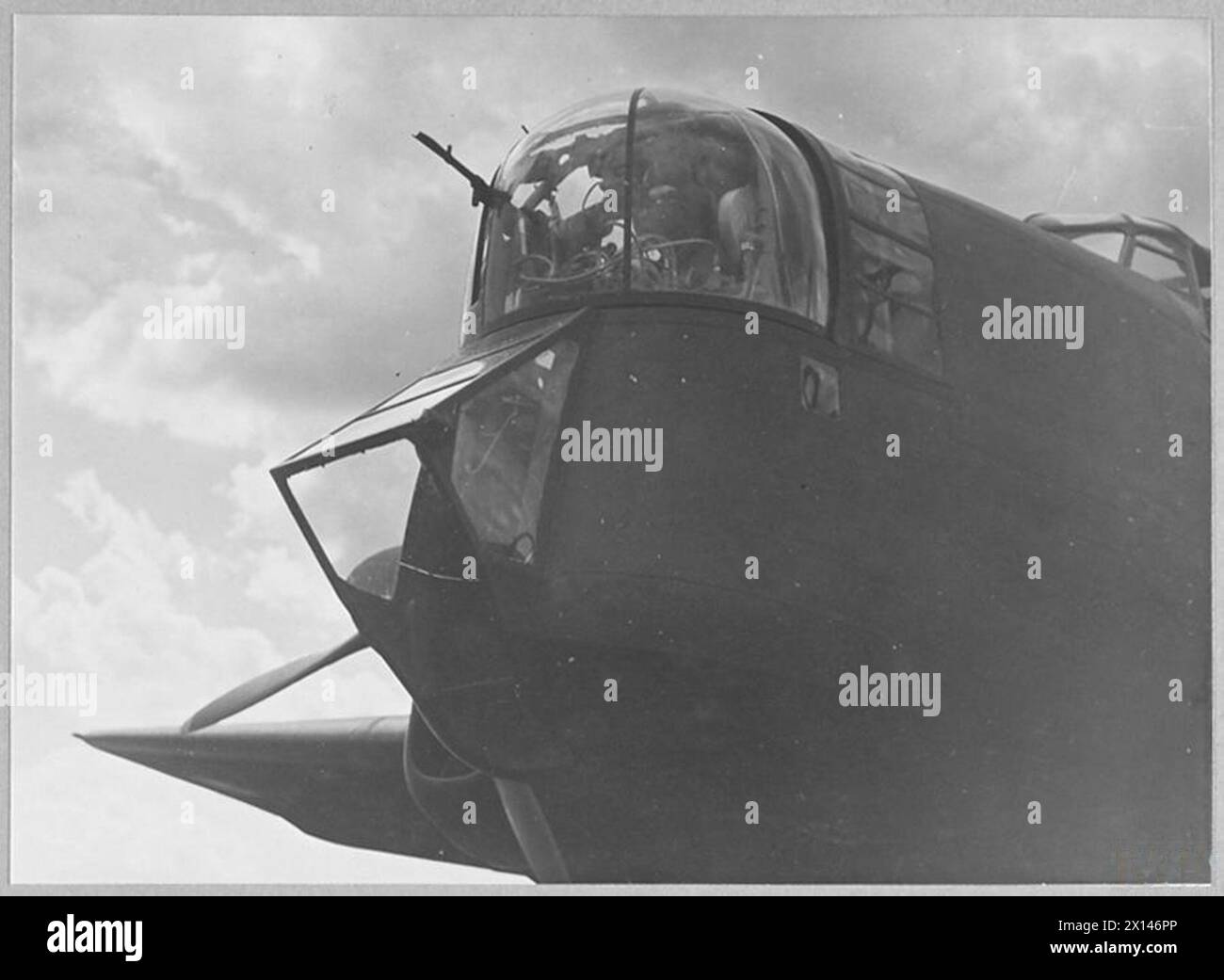 The front gunner of a Whitley bomber of the Royal Air Force is ready ...