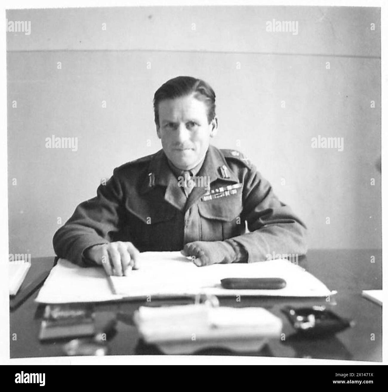 A photograph at the Italian HQ shows Lieutenant General A.E. Harding ...