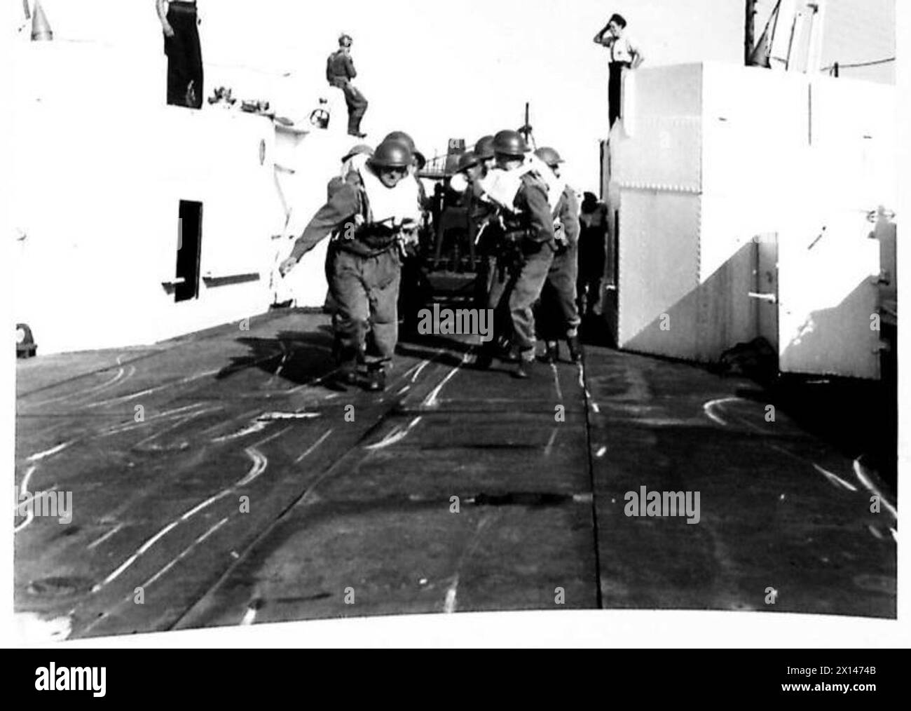 LARGE SCALE EXERCISE - Bofors guns are hauled into position on one of ...