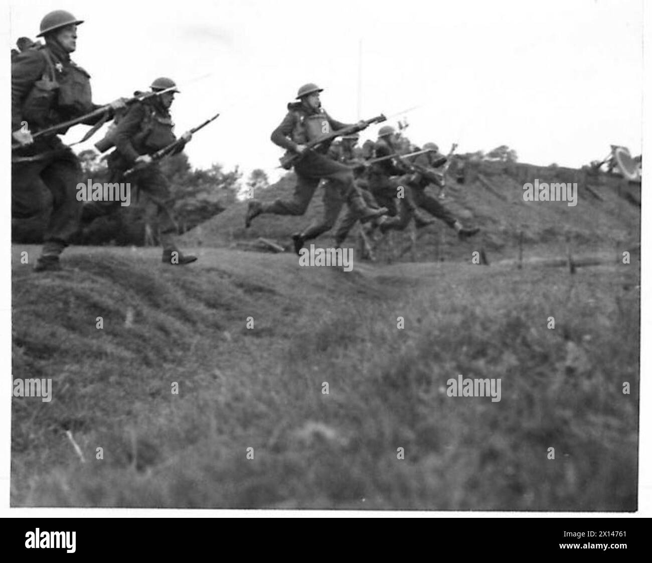 Czech infantry participate in a bayonet charge during a training ...