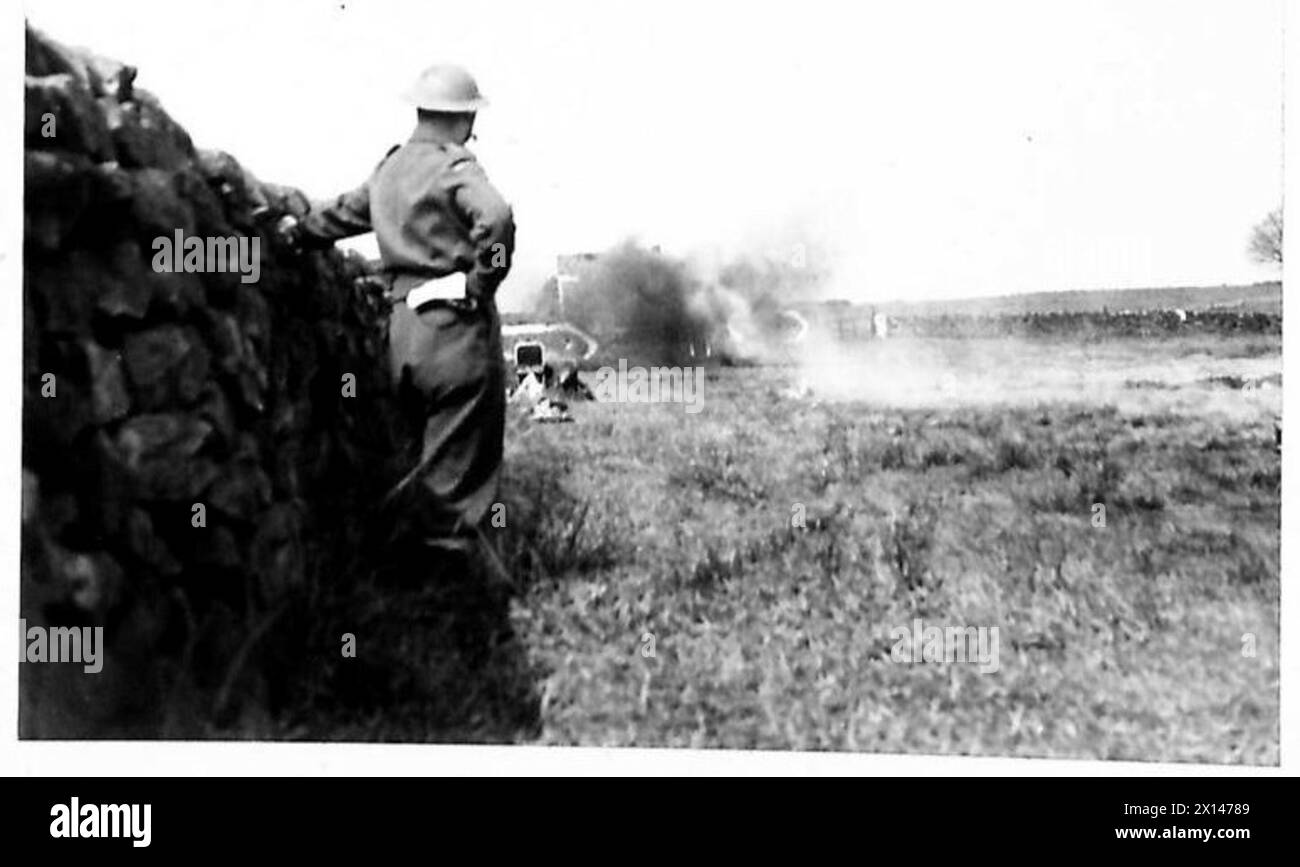 DEMONSTRATION OF ANTI-TANK WEAPONS - Home Guards use a thermos grenade ...