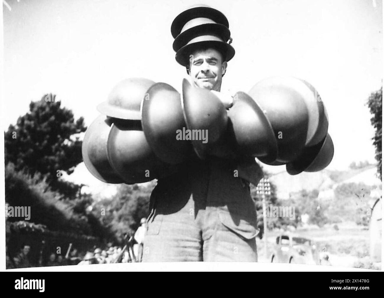ANOTHER CANADIAN BELGIAN CONTINGENT - Steel helmets ready for issue ...