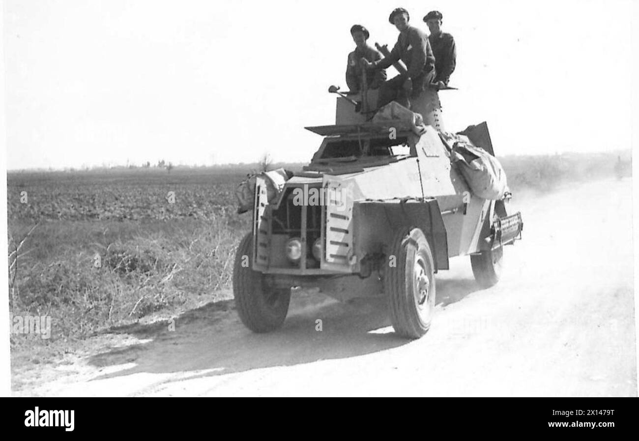 PHOTOGRAPHS TAKEN OF BRITISH TROOPS IN GREECE - A British armoured car ...