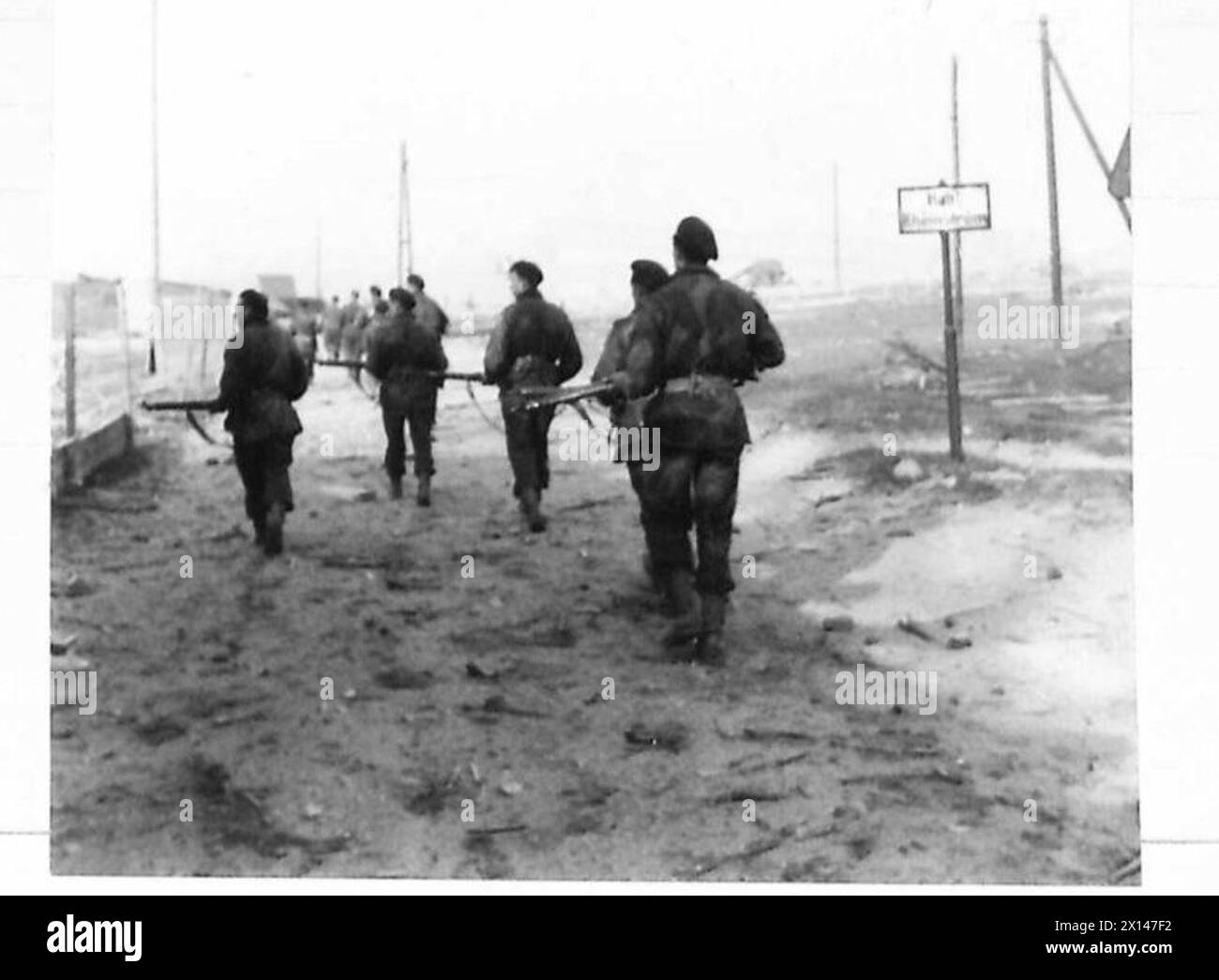 ASSAULT ON THE RHINE AND CAPTURE OF WESEL - Commandos patrolling the ...