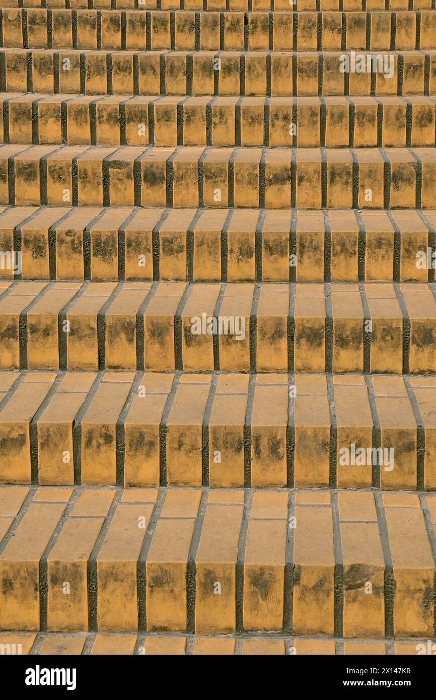A symmetrical pattern brick stairs. Backgrounds and textures. Details ...