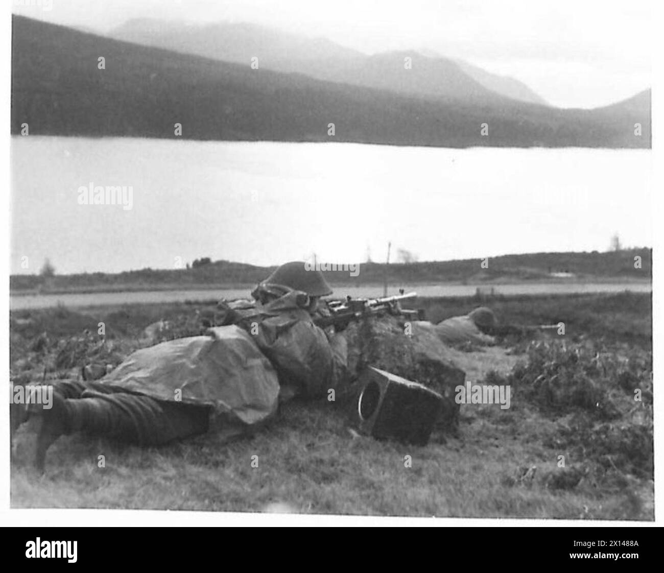 AN EXERCISE IN SCOTLAND - A Royal Scots Fusilier Bren gunner in action ...