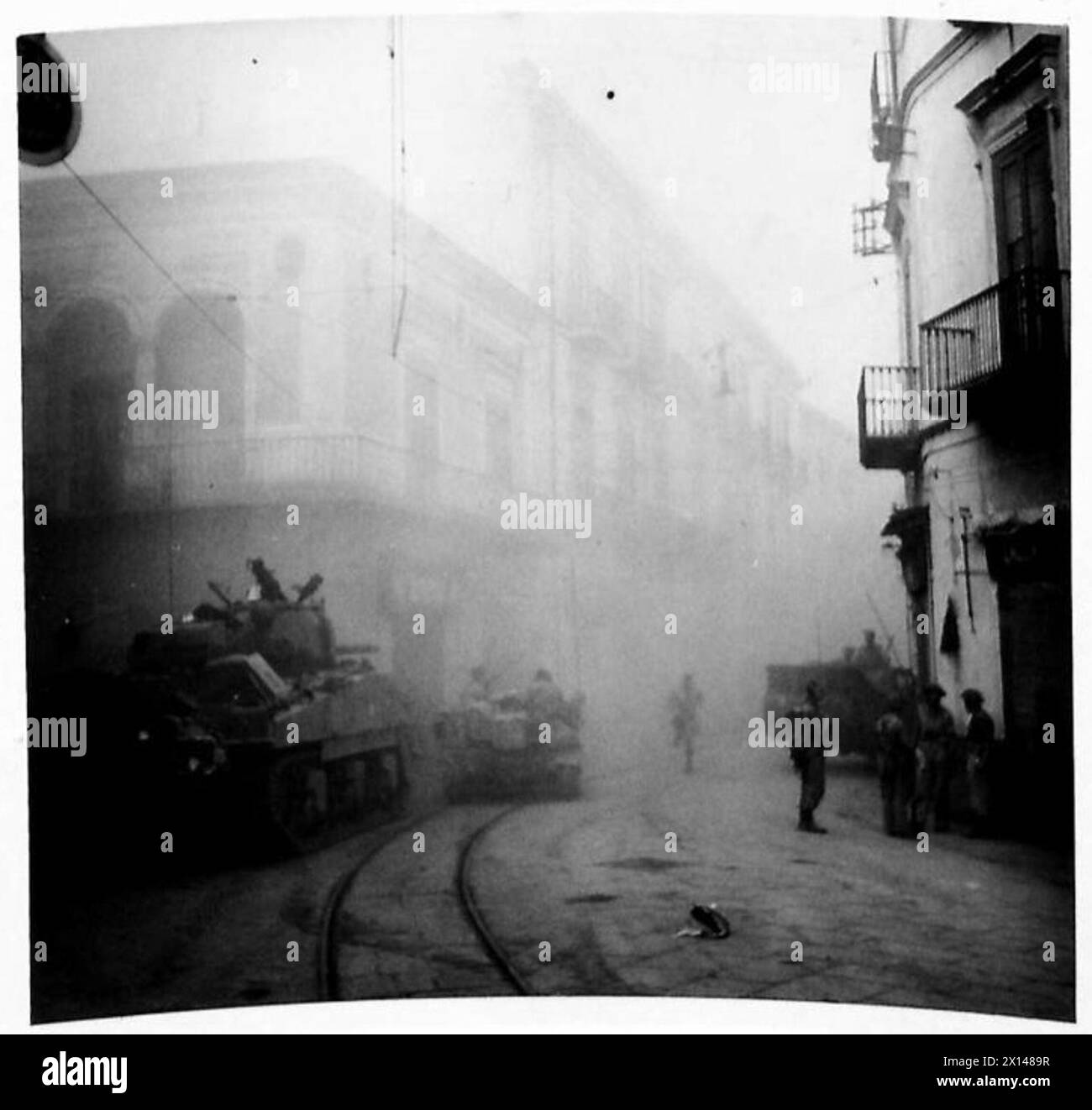 INVASION OF ITALY : FIFTH ARMY - Tanks passing through the main ...
