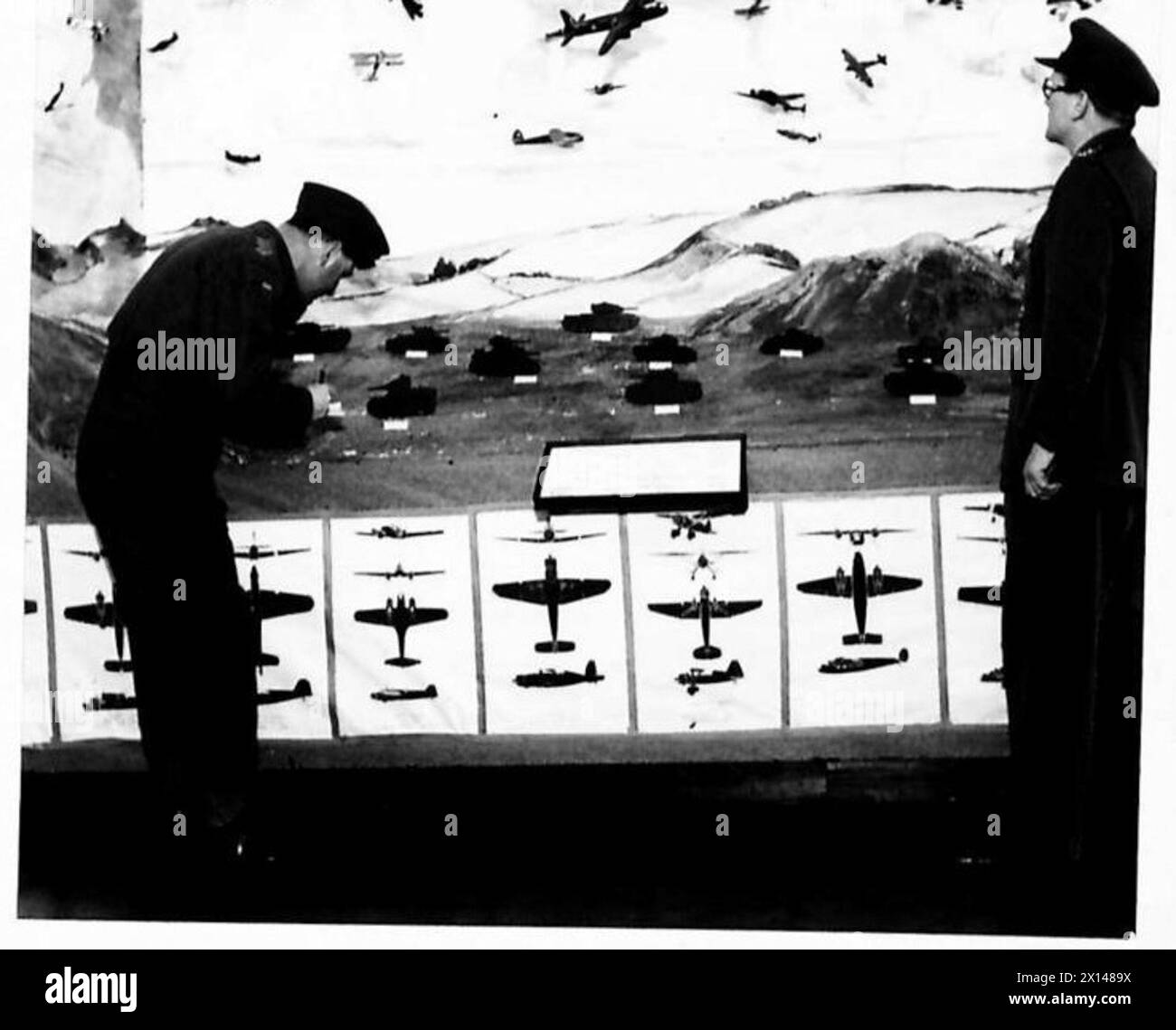 RASC officer trainees are studying aircraft and tank recognition using ...