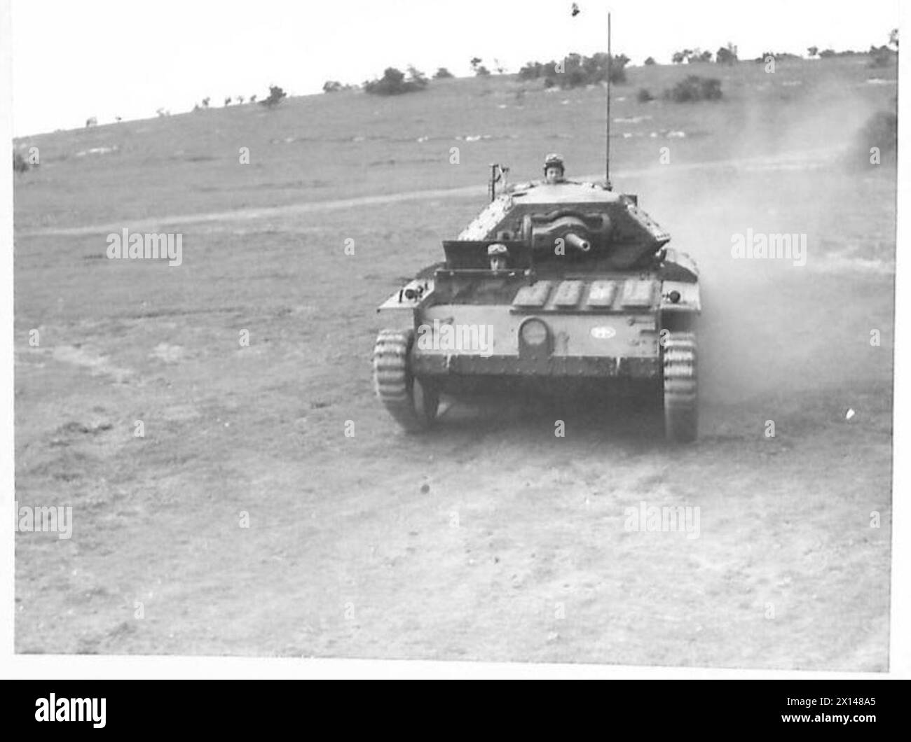 "BUMPER"EXERCISE - A "Covenanter" tank going all out across open heath ...