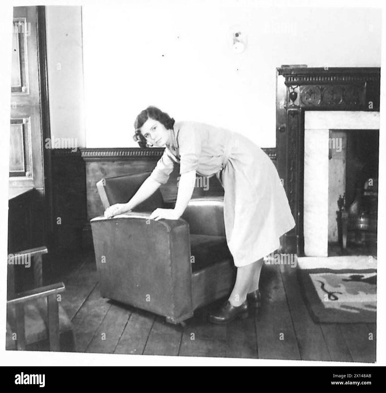 An ATS orderly is photographed performing work duties, documenting ...