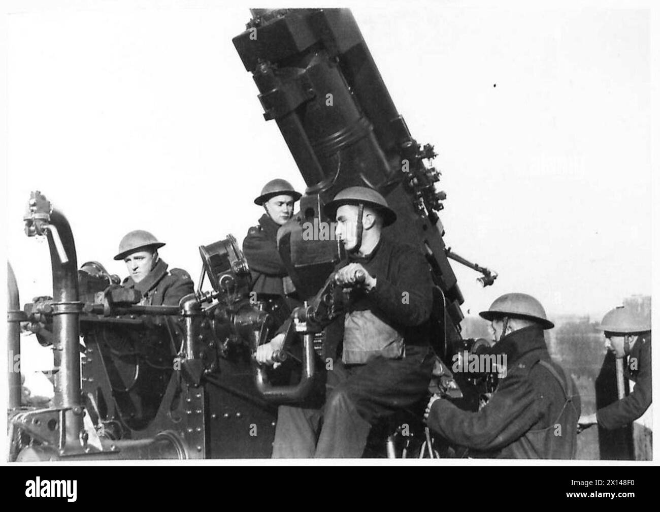 An anti-aircraft gun station is positioned at Chatham for British Army ...