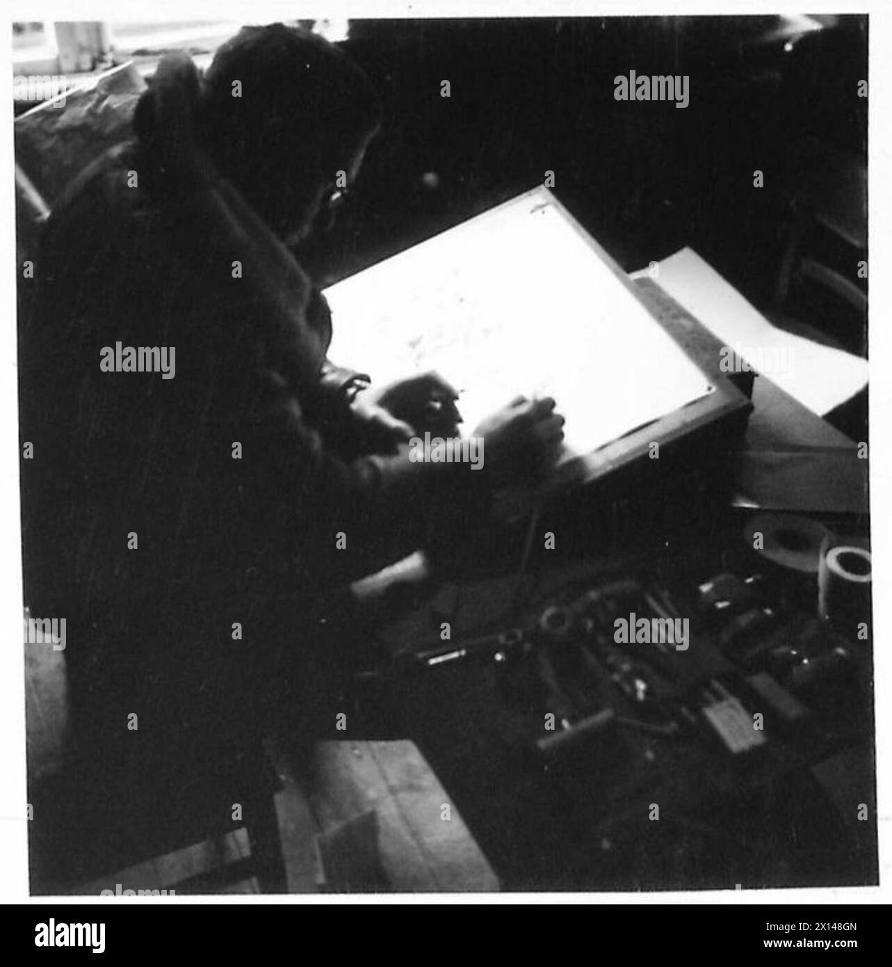 GILES IN GERMANY - He finds a quiet room and completes a cartoon ...