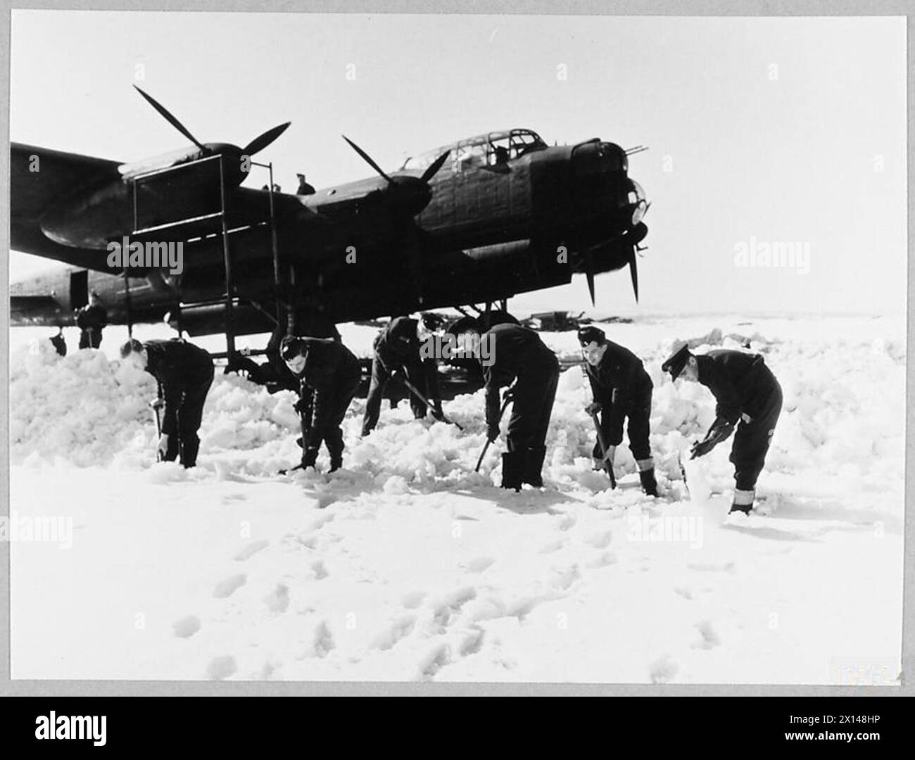 SNOW CLEARING AT A BOMBER COMMAND STATION - 12422 Picture (issued 1944 ...