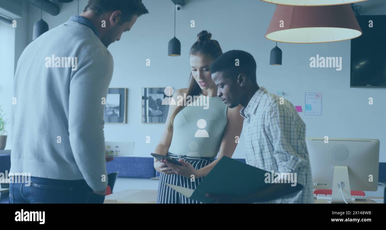 Image of icons over diverse business people using tablet Stock Photo ...