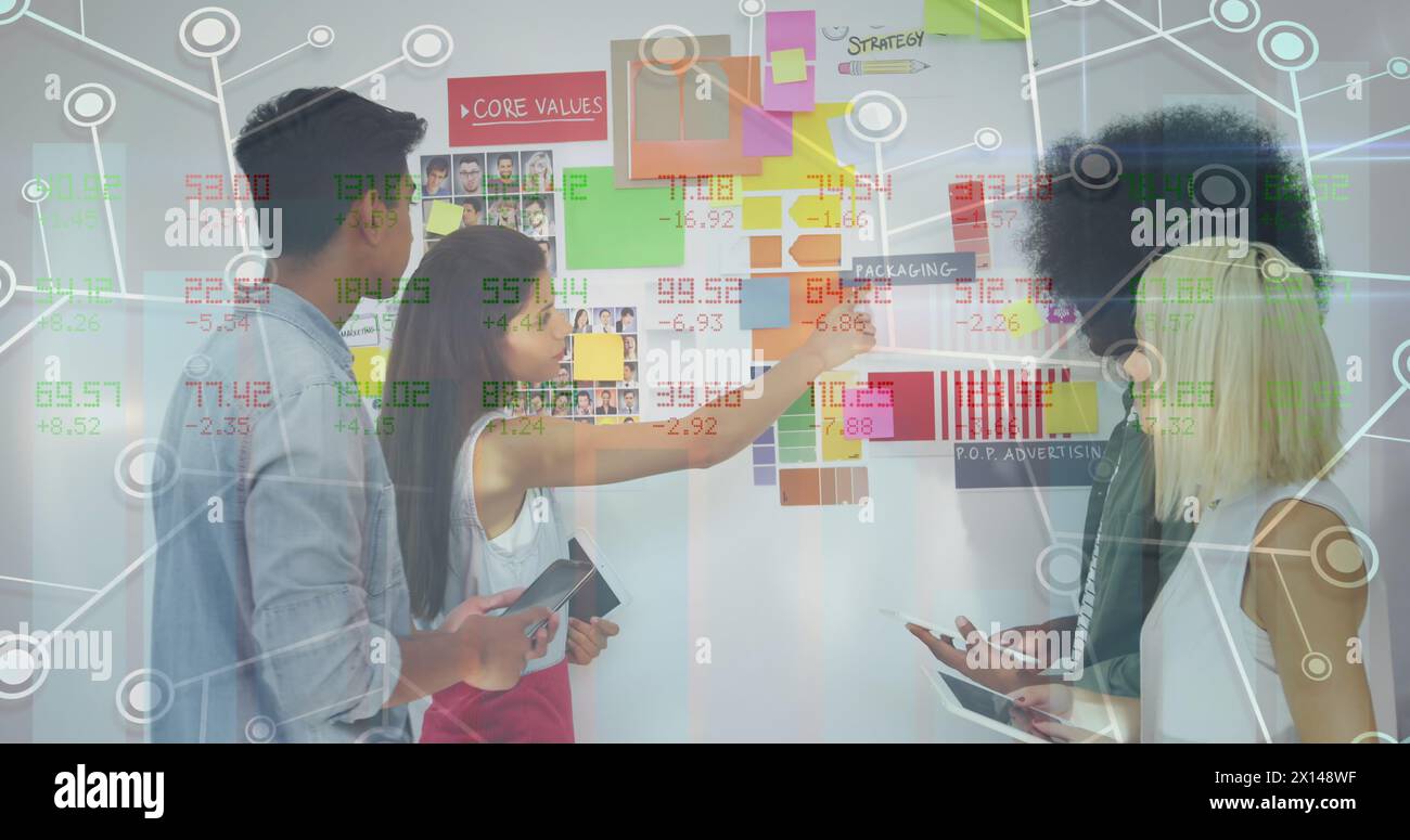 Image of financial data processing over diverse business people working ...
