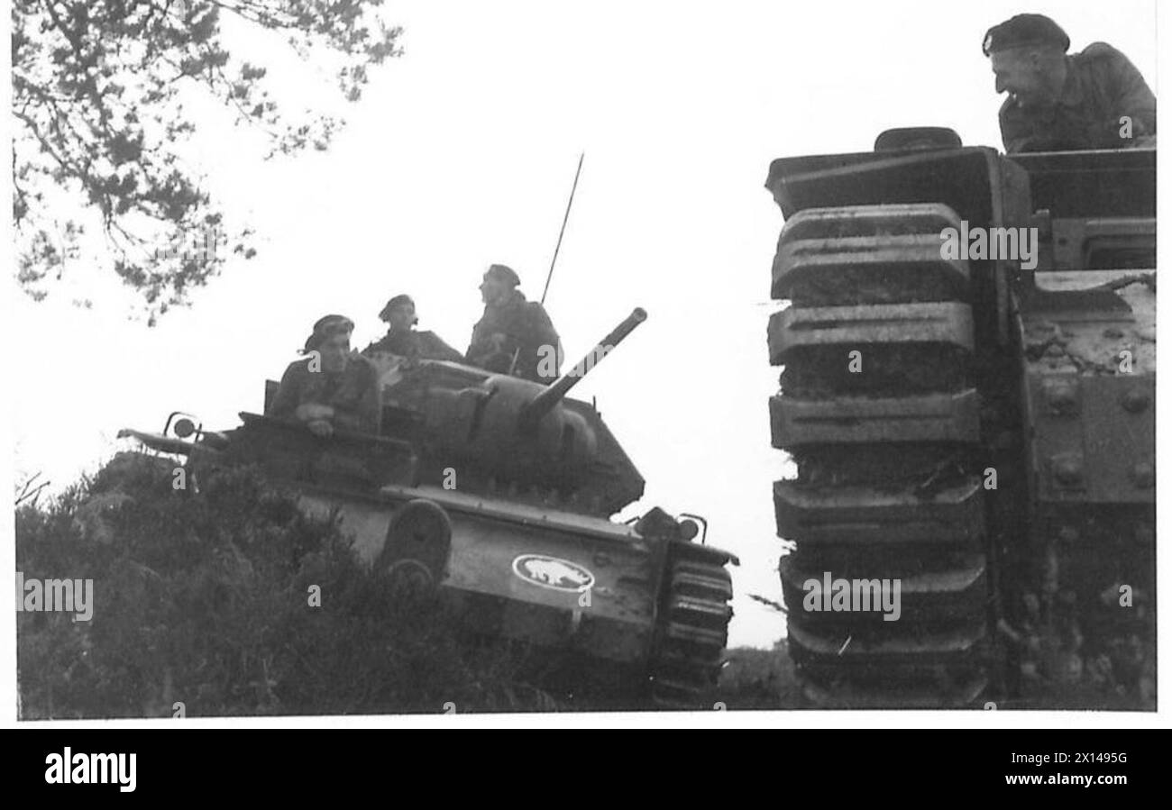 ARMOURED DIVISION TRAIN FOR BATTLE - Angle shots of "Covenanter" tanks ...