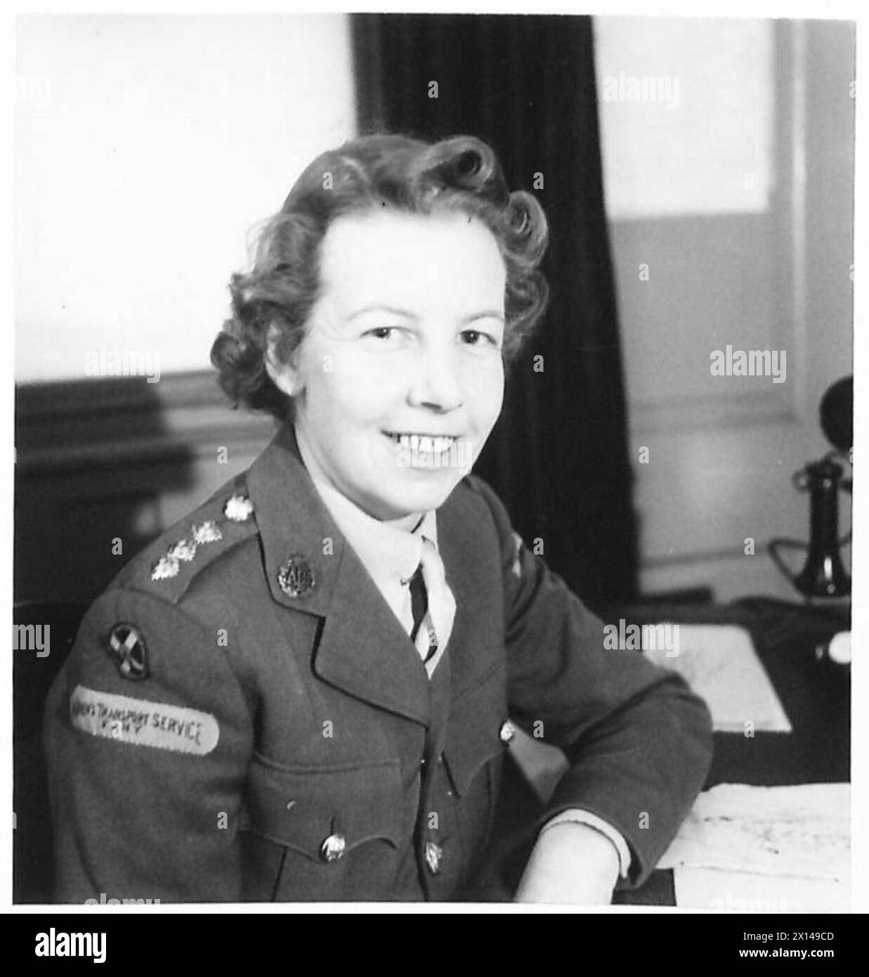 An ATS officer assigns accommodation to U.S. troops in a British Army ...