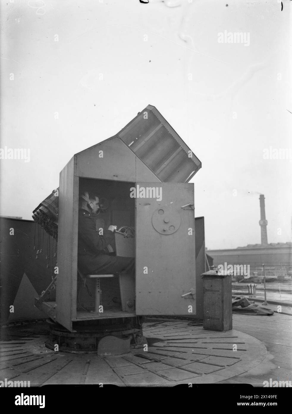 THE ROYAL NAVY DURING THE SECOND WORLD WAR - A gunner in the cabin of ...