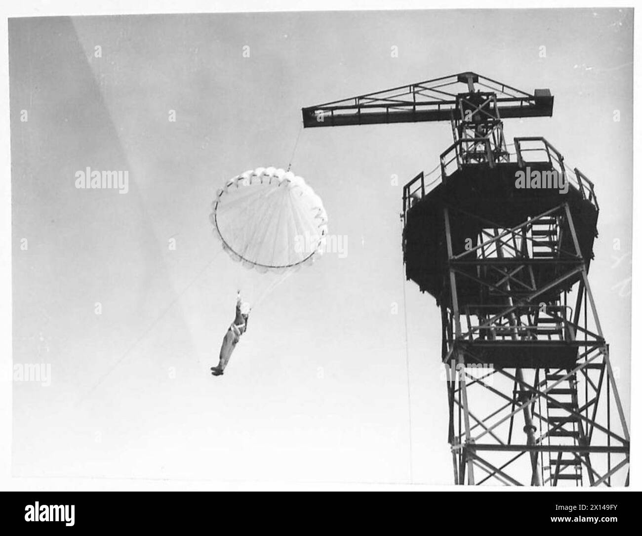 THE POLISH ARMY IN BRITAIN, 1940-1947 - Trainee paratrooper in mid-air ...