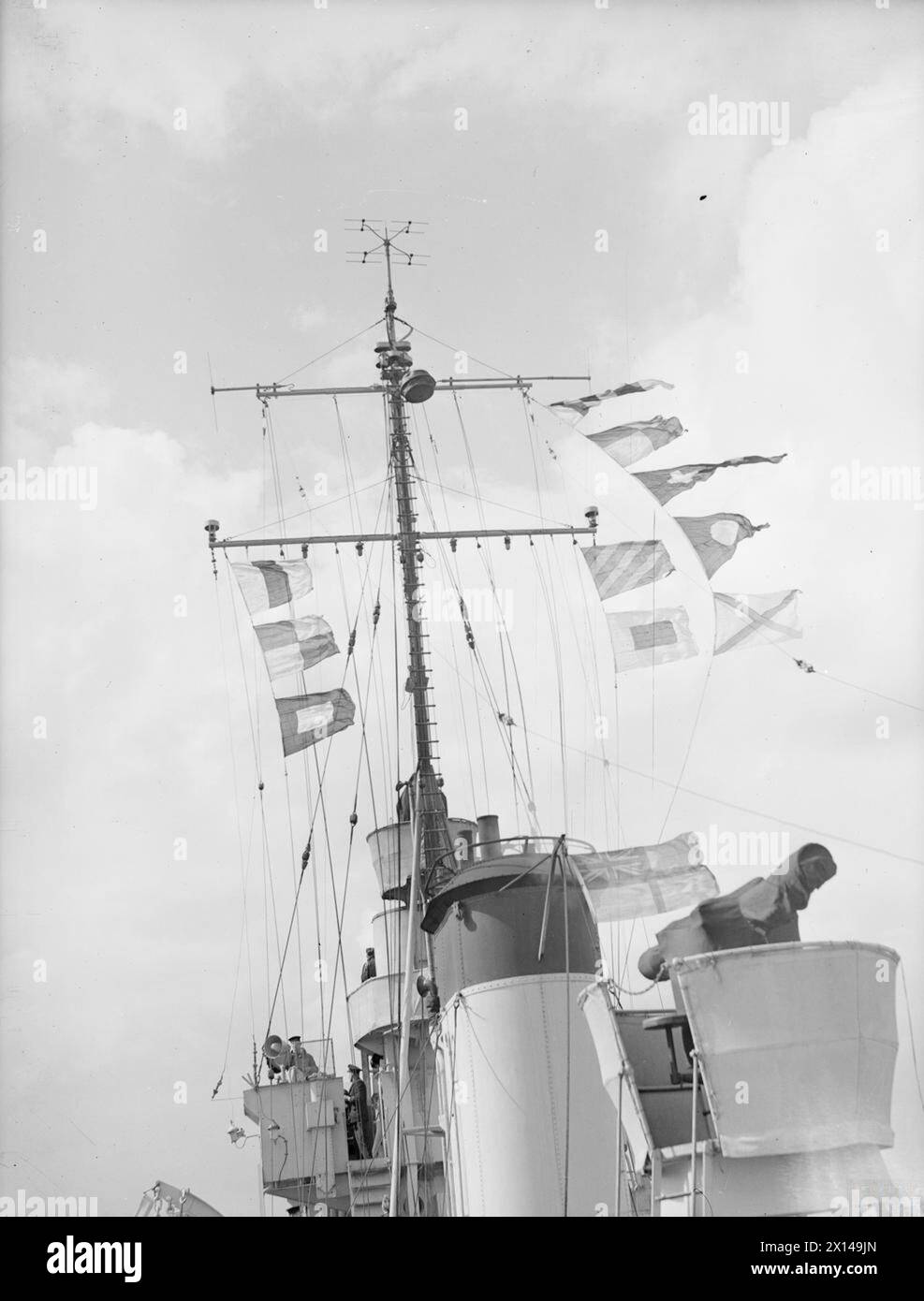 A British Algerine-class minesweeper operates with a mixed flotilla ...