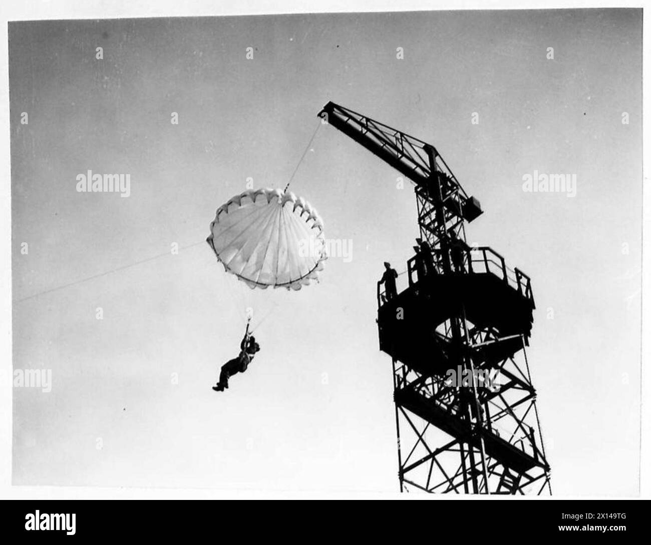 THE POLISH ARMY IN BRITAIN, 1940-1947 - Trainee paratrooper in mid-air ...